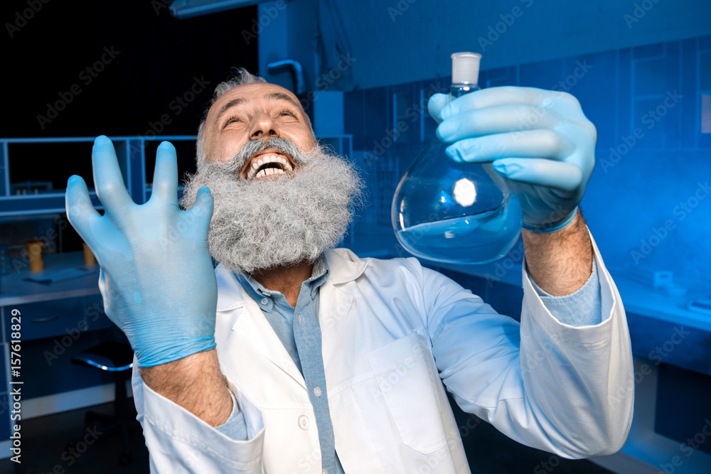 happy grey haired scientist celebrating success of scientific ...