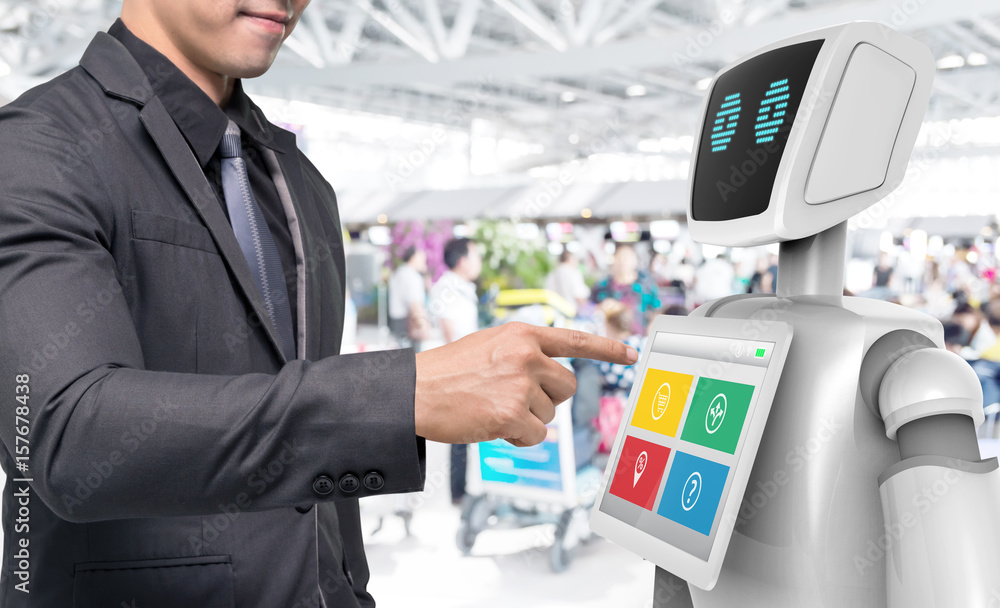 Robotics Trends technology business concept. Man suit point finger to ...