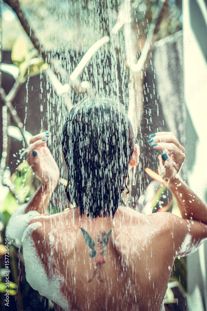 Beautiful Naked Young Woman Taking Shower In Bathroom Outside On He