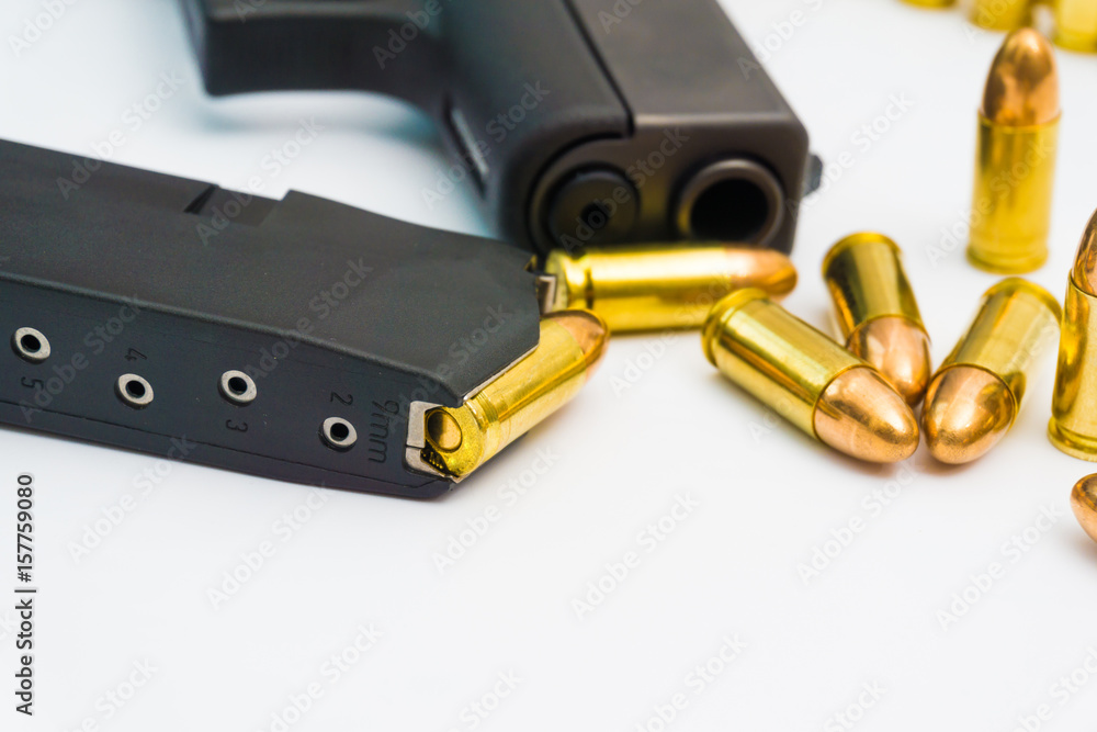 Black polymer 9mm Pistol and Full Metal Jacket Bullets Stock-Foto ...