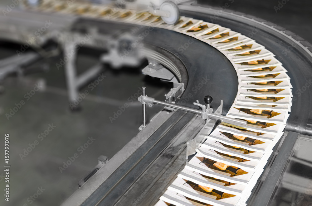 Stack of magazines on offset printing machine conveyor belt Stock Photo ...
