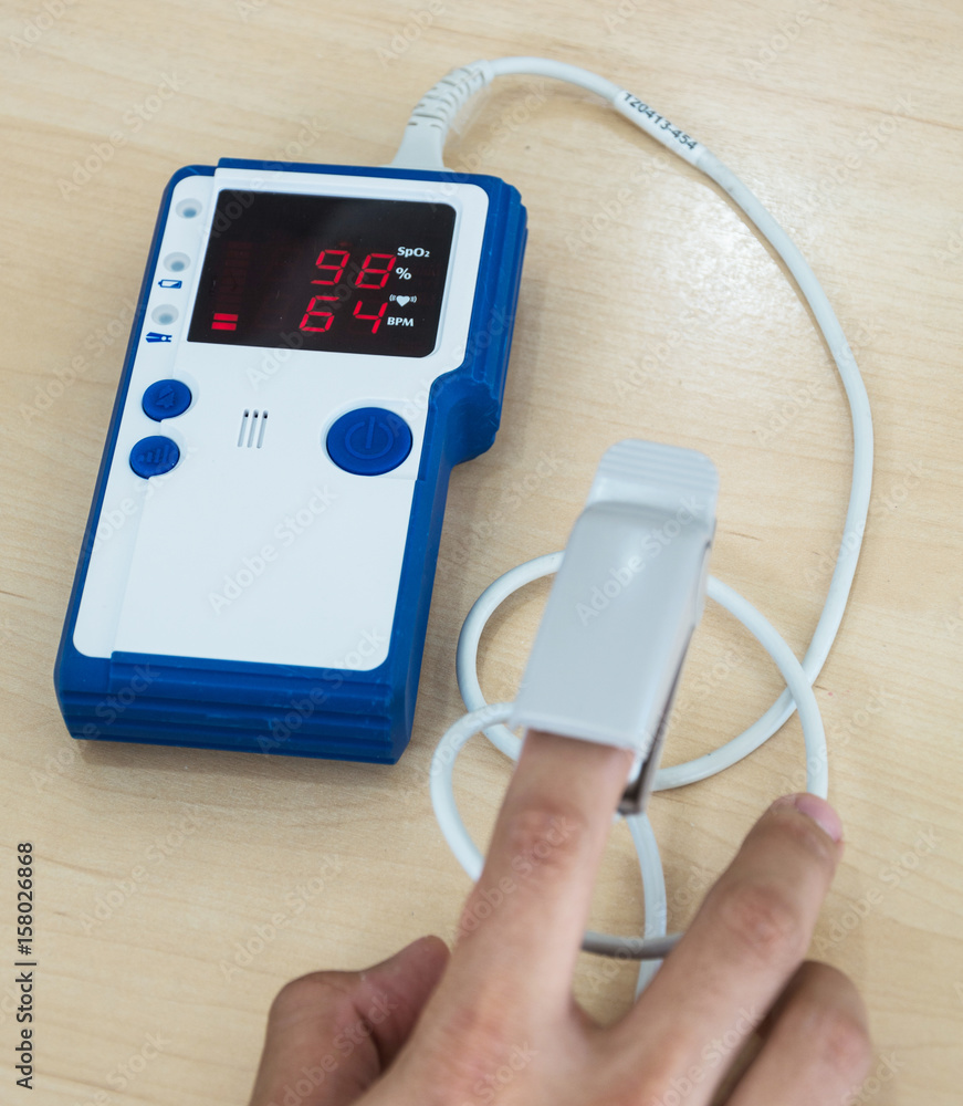 Pulse oximeter used oxygen levels to and measure pulse rate for patient ...
