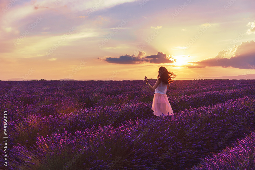 Walking women in the field of lavender.Romantic women in lavender ...