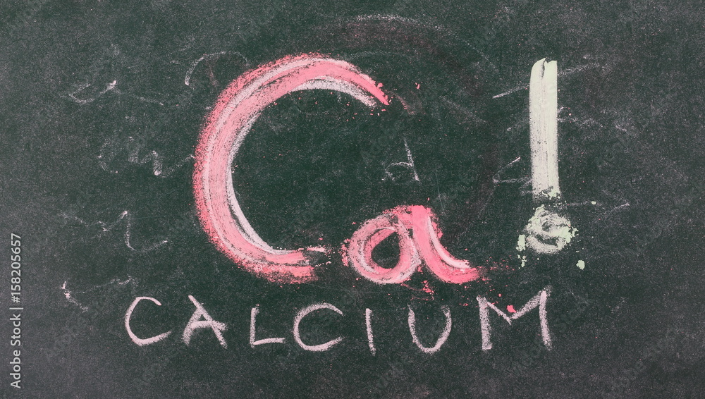 Calcium element chemistry symbol on chalkboard, blackboard background ...