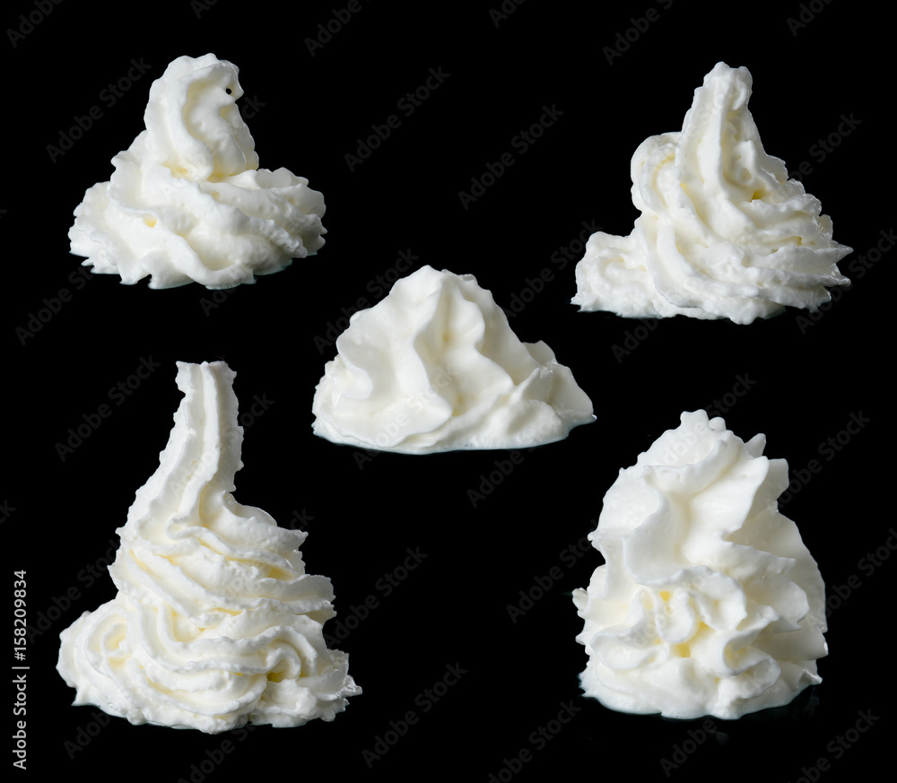 whipped cream on a black background Stock Photo | Adobe Stock