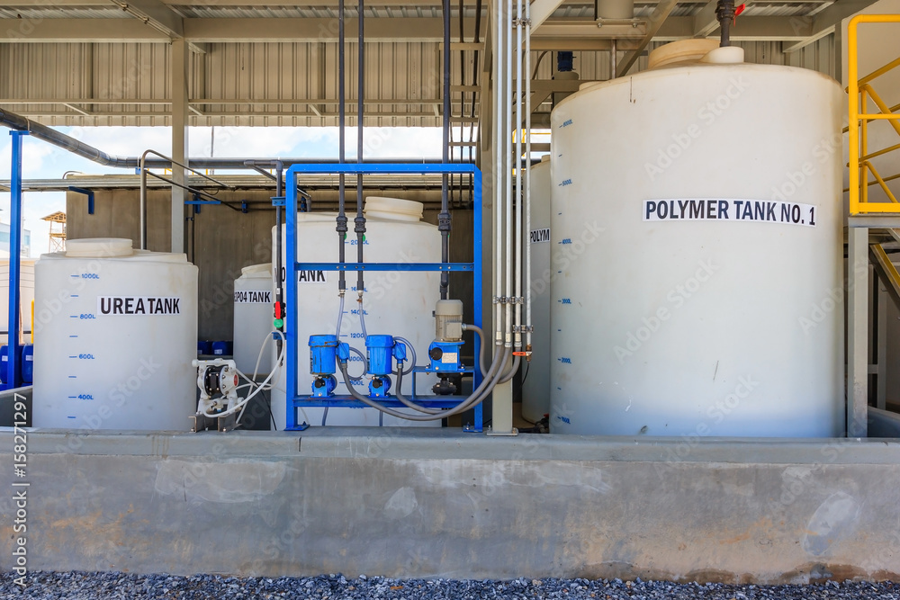 Polymer treatment tank, Waste processing facility exterior Stock Photo ...
