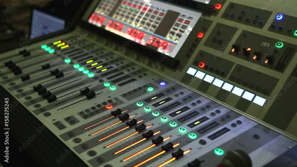 Professional audio console in a concert, sound mixer console during a ...