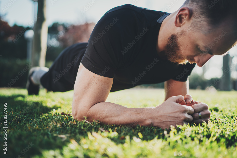 Outdoor Workout lifestyle concept.Young Muscular athlete man doing ...