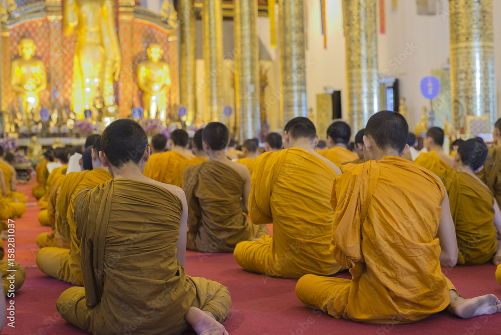 Monks praying Stock Photo | Adobe Stock