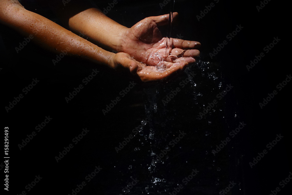 Human Hand Capturing The Water That Is Flowing With Motion Blur Effect ...
