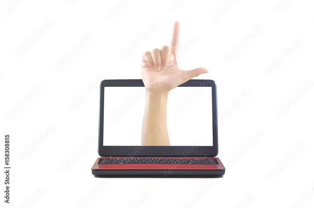Hand showing a letter L sign for loser coming out of a laptop screen. A ...