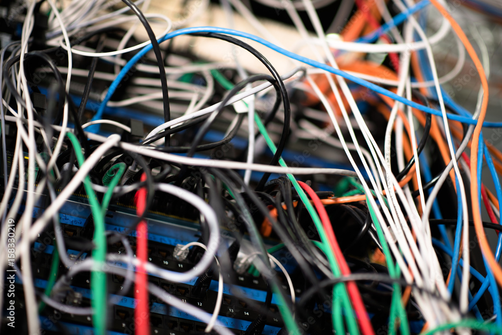 wires and cables in a server room Stock Photo | Adobe Stock