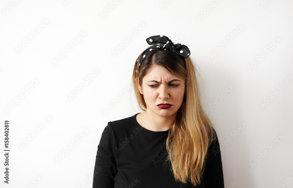 Negative human facial expression. Fashion beautiful girl resentfully ...