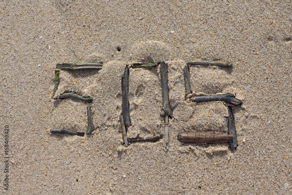 Word S O S On Sand Of Beach Made Of Sticks Watch Out For The Sun
