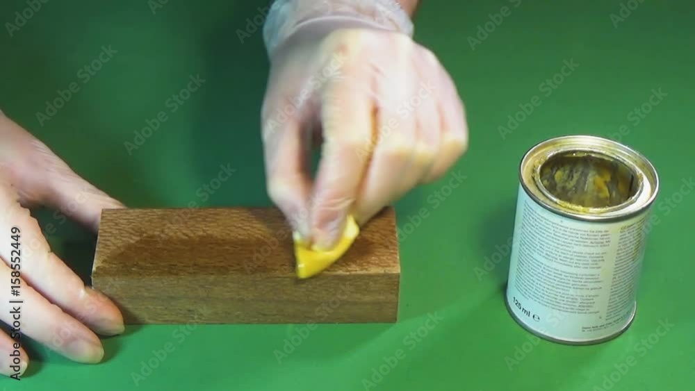 Stockvideo Lacewood. The bar of solid wood is covered with stain. The ...