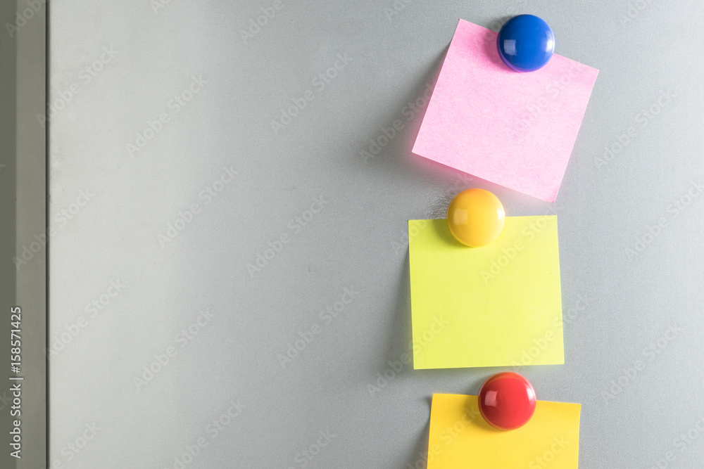 blank Sticky note and magnet on refrigerator , three paper sheet ...