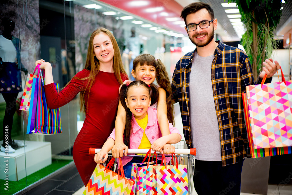 Happy family shopping Stock Photo | Adobe Stock