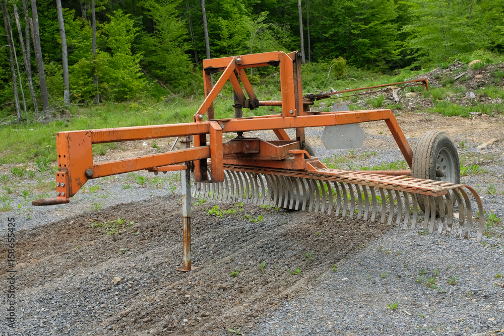 Road gravel and stone rake for grading Stock Photo | Adobe Stock