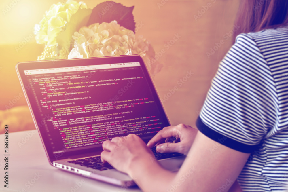 Programmer Typing New Lines of HTML Code. Laptop and Hand Closeup ...