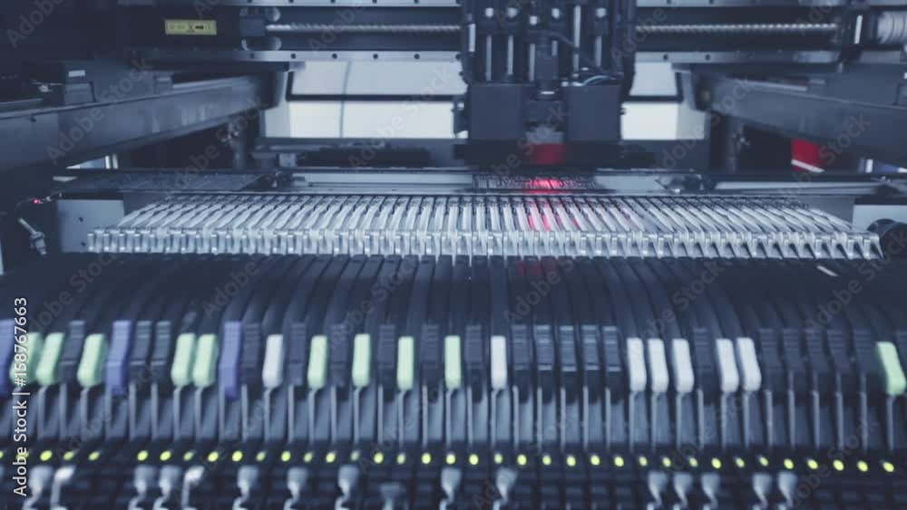 Automated Electronic circuit board production. Machine Produces Printed ...