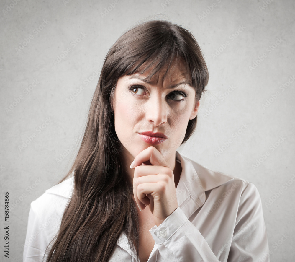 Curious woman thinking Stock Photo | Adobe Stock