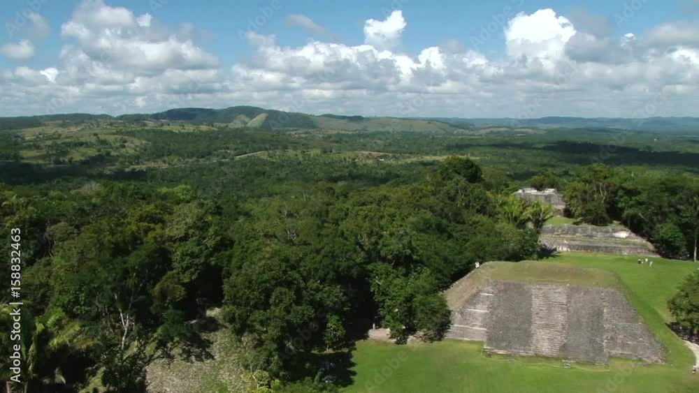Pan across from left to right from the top of temple El Castillo at ...