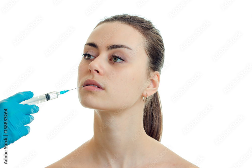 horizontal portre young beautiful girl at the doctor with syringe Stock ...