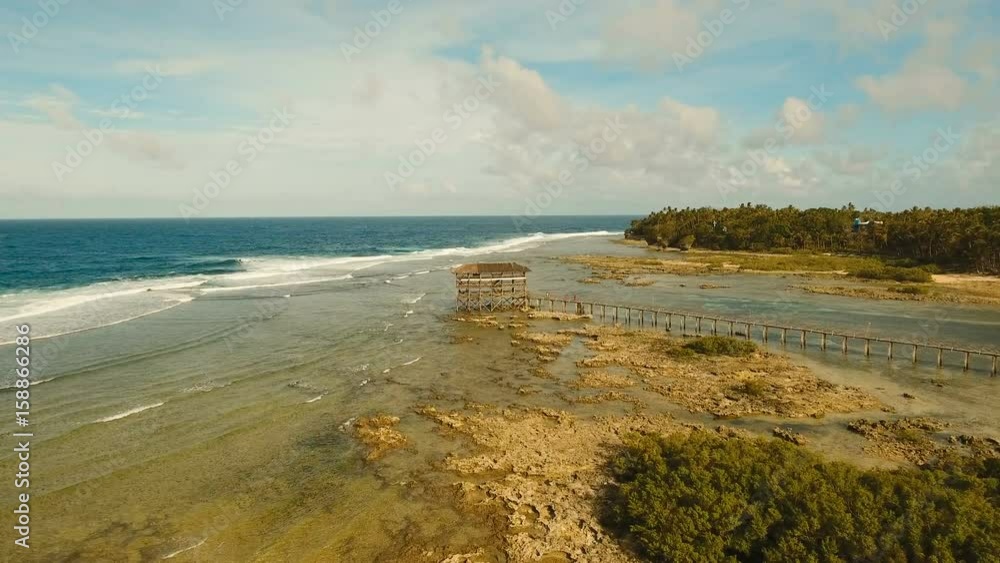 Viewpoint in the ocean at Cloud Nine surf point, Siargao island ...