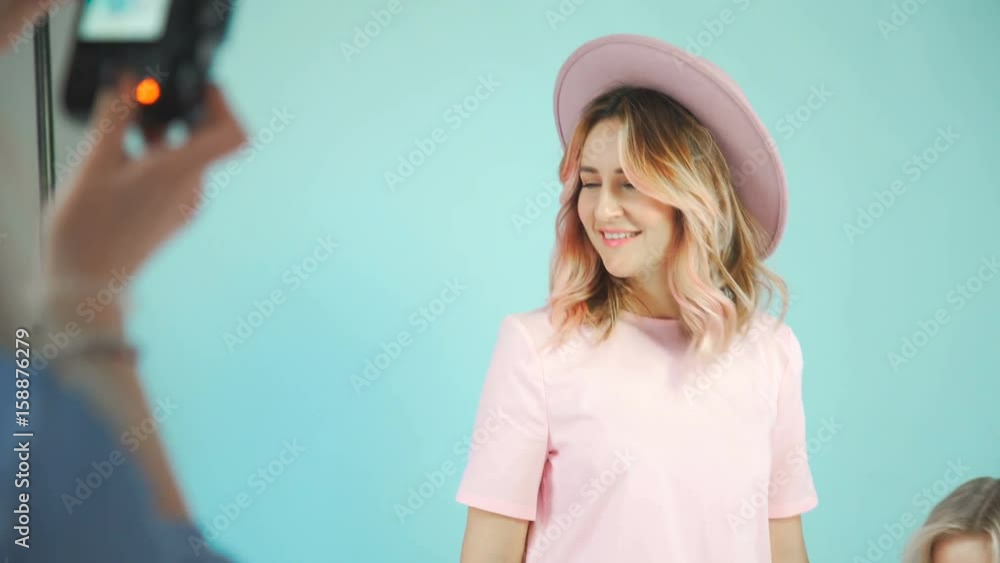 Two girls are photographed in the studio and have a good time together ...