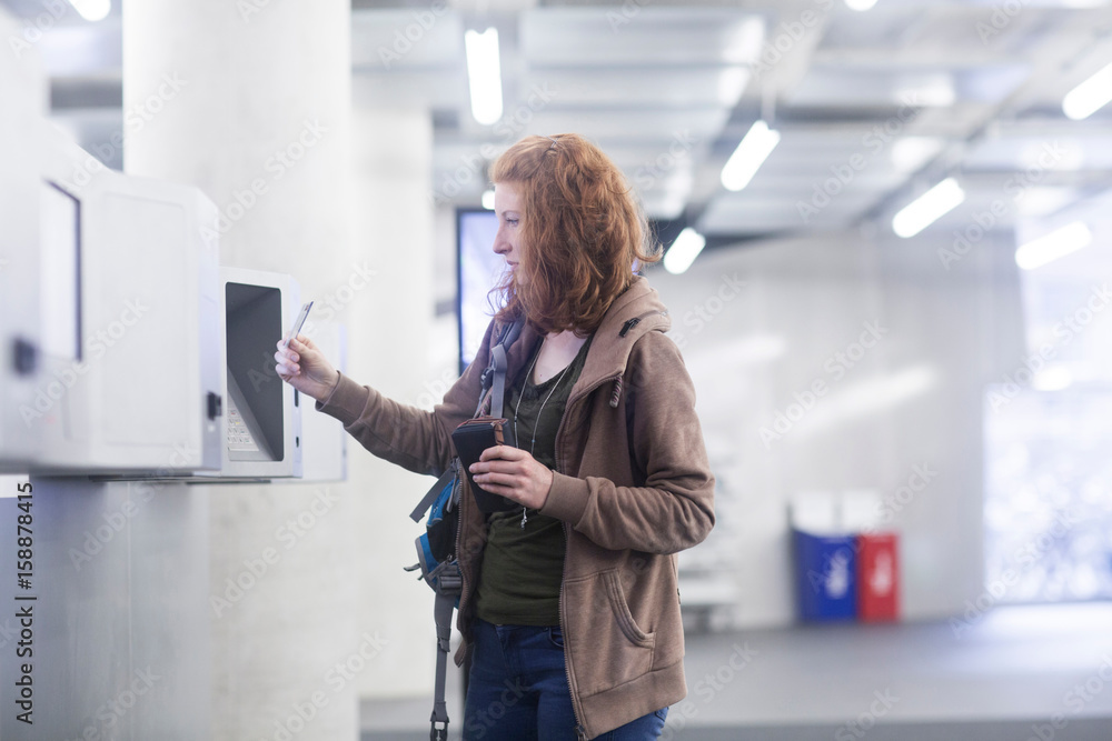 Student in library Stock Photo | Adobe Stock
