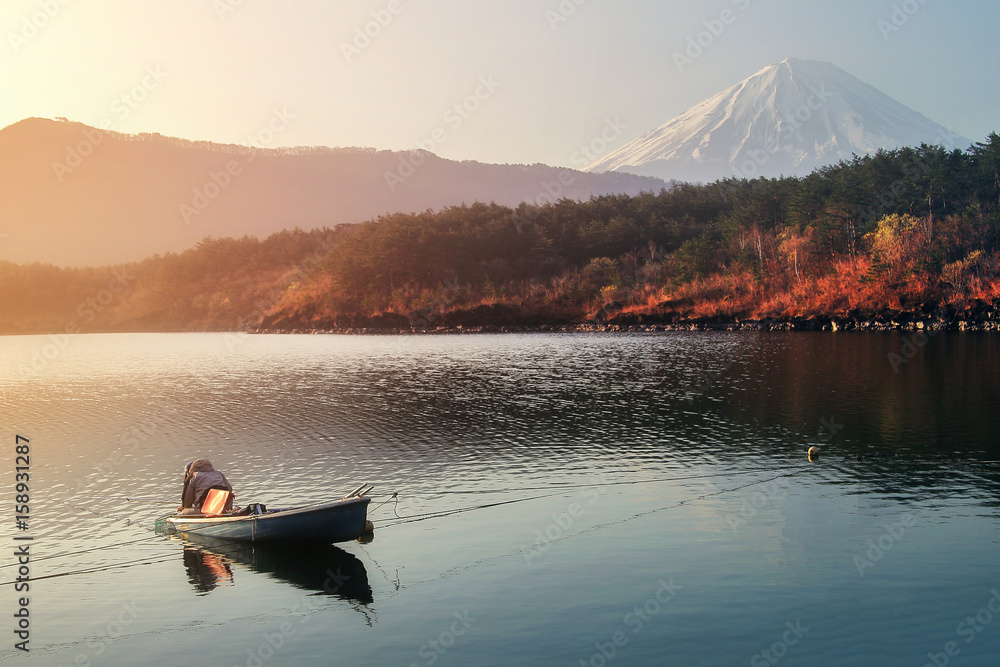 Fishermen are fishing at Lake Saiko with beautiful scenery of nature ...