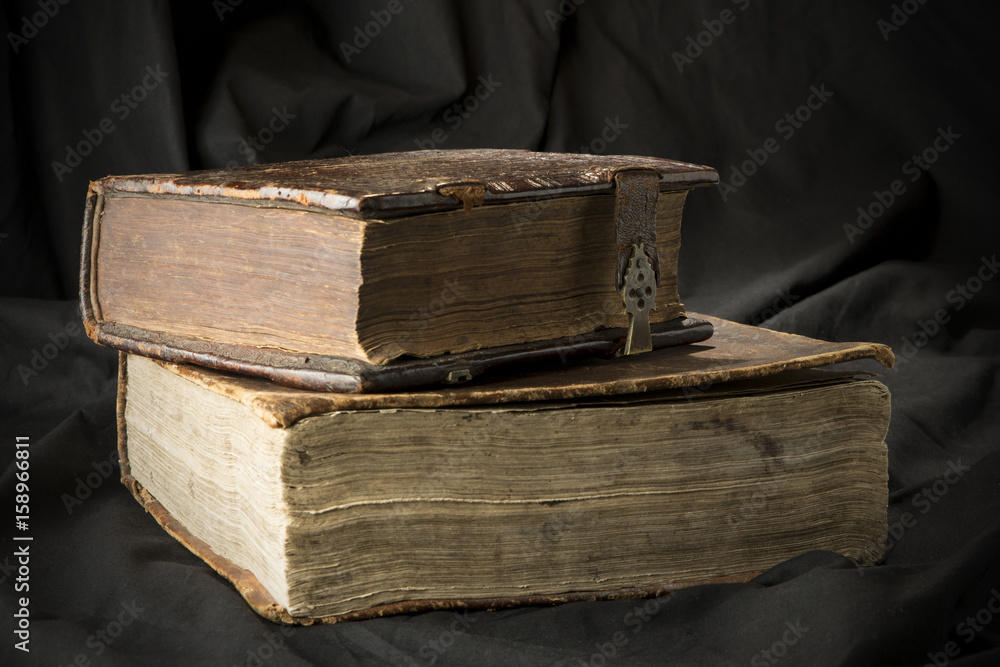 Old books on black background. Ancient christian Bible. Antique Holy ...