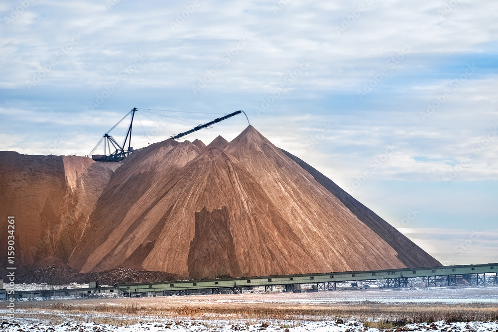 Extracting and mining potassium and magnesium salts.Large excavator ...