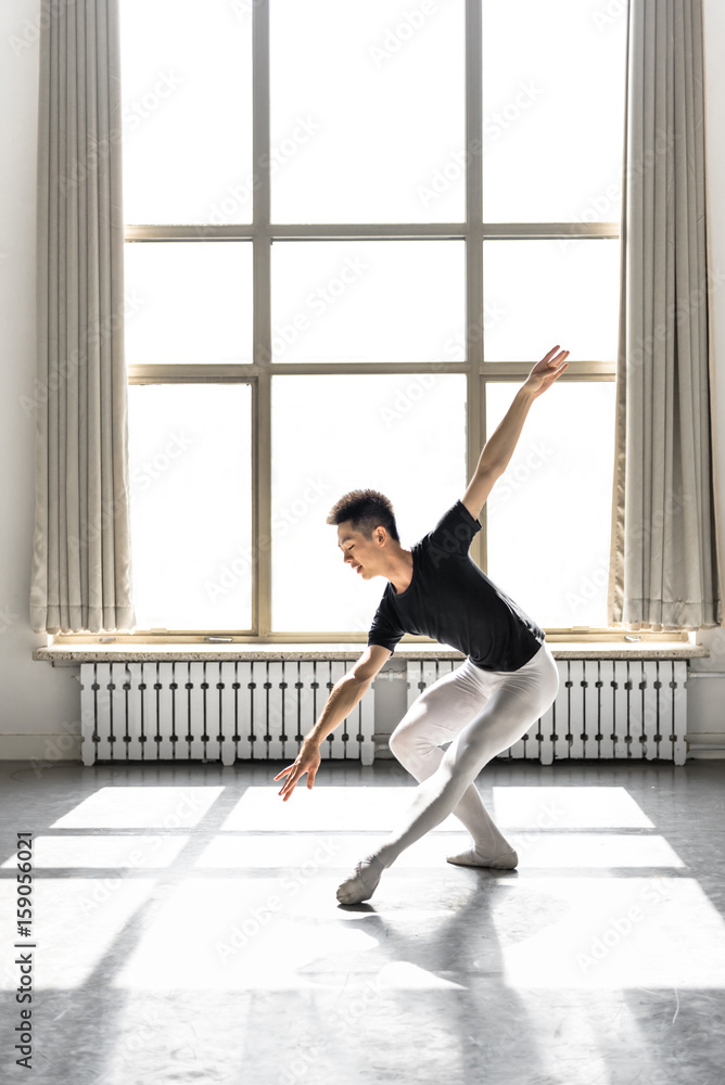 Young professional male dancer practicing in a studio Stock Photo ...