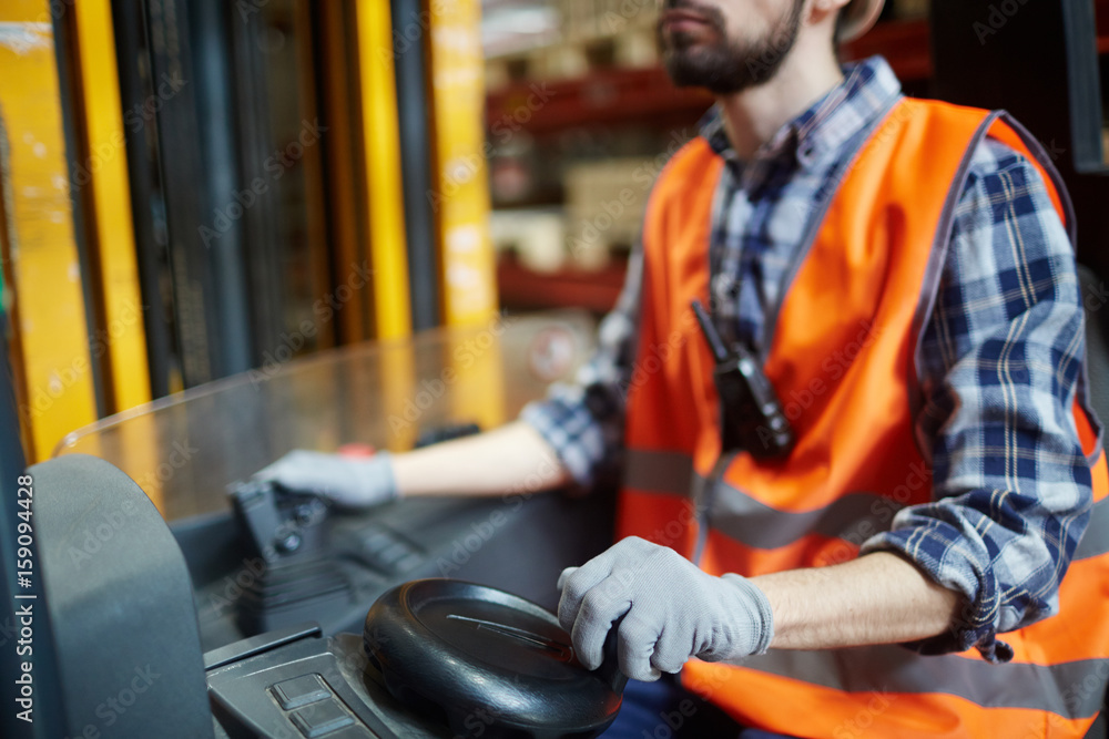Loader operating automatic forklift machine Stock Photo | Adobe Stock
