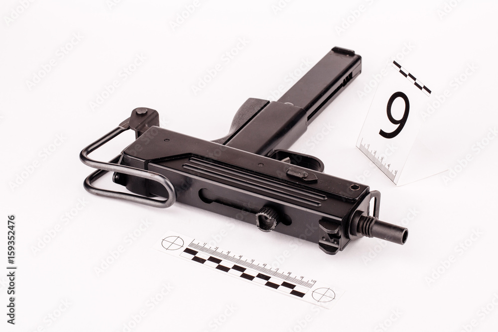 Submachine Gun with bullet cartridge on white background Stock Photo ...