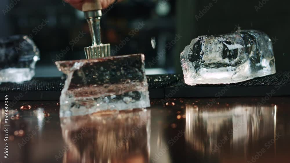 Slow motion process of ice cracking at bar counter background Stock ...