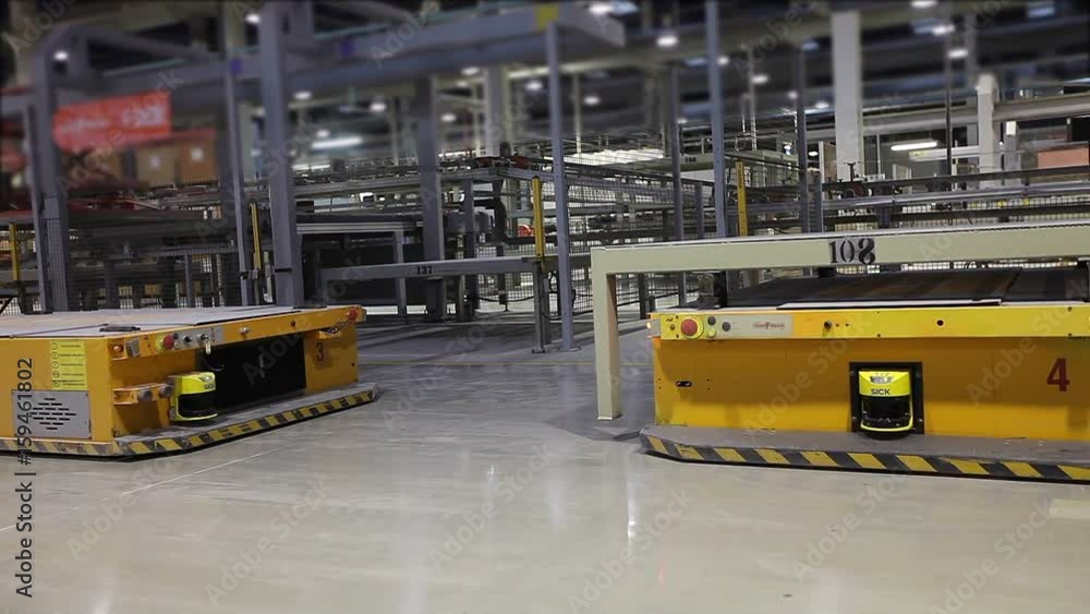 Electrical Automated Guided Vehicles Platform. Modern factory interior ...