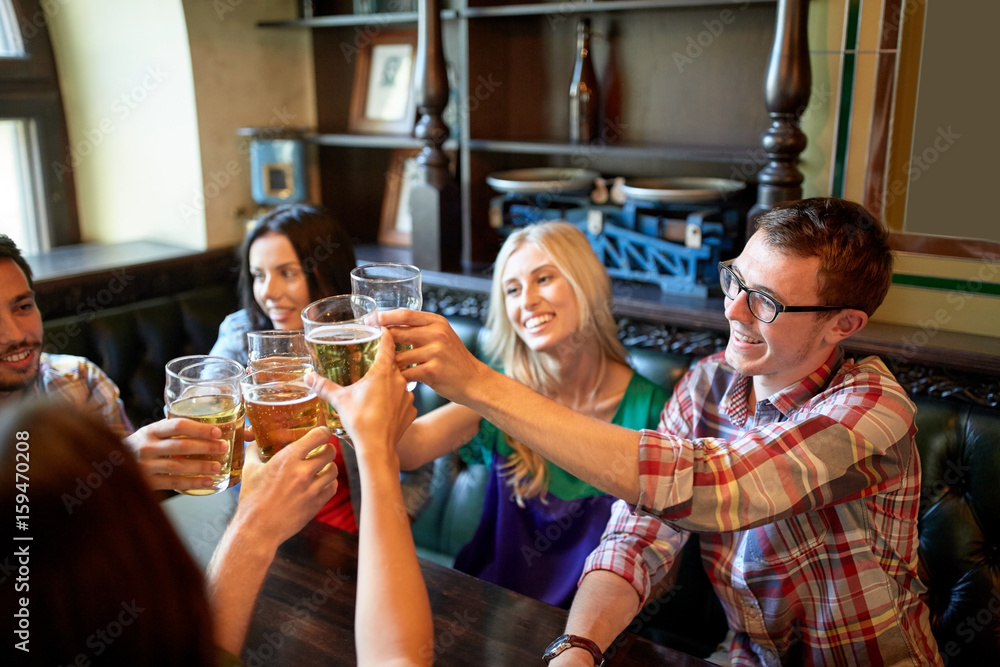 happy friends drinking beer at bar or pub Stock Photo | Adobe Stock