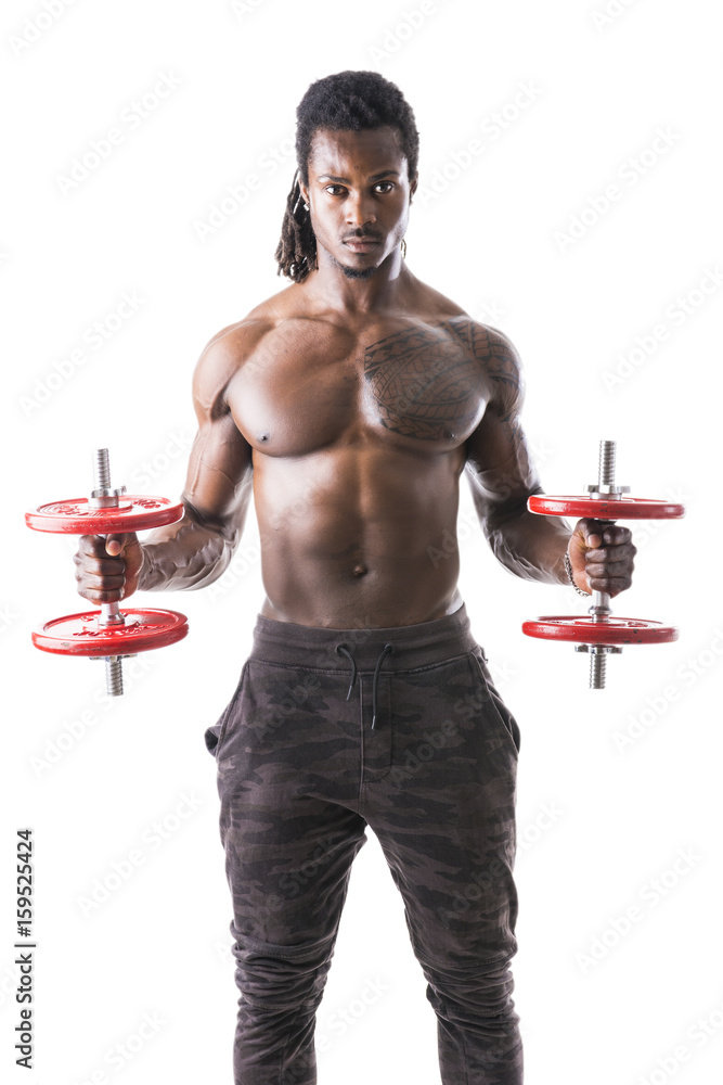 Muscular sexy shirtless young black man exercising biceps with ...