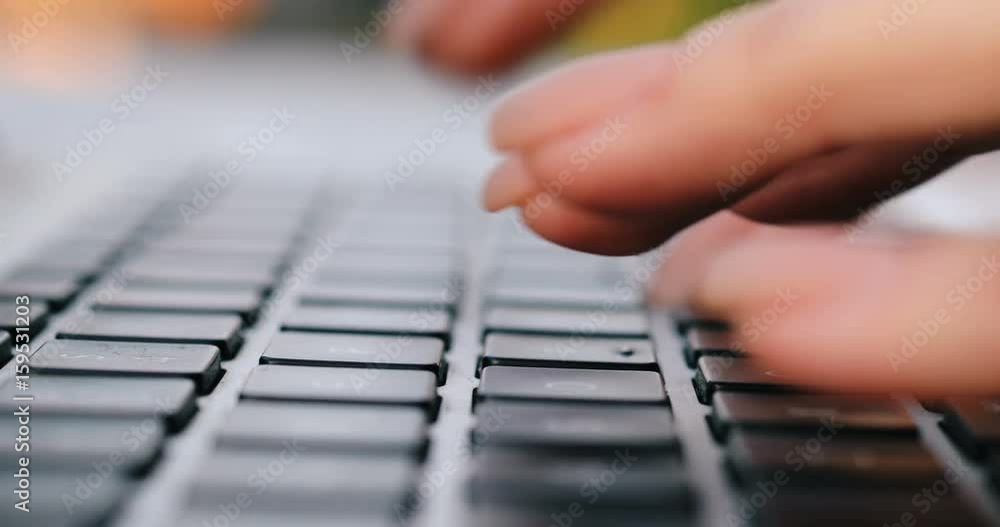 Closeup of business woman hand typing on laptop keyboard. Closeup of a ...