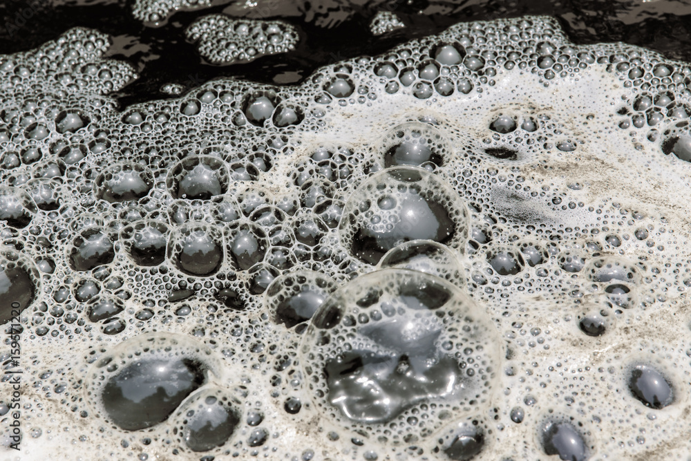 oxygen bubble in dirty sewage water treatment in factory pond. Stock ...