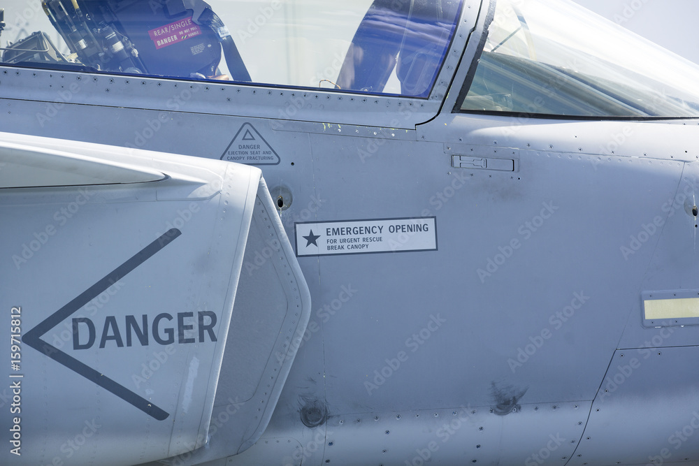Air intake of a modern jet fighter. Danger text on the intake. Stock ...