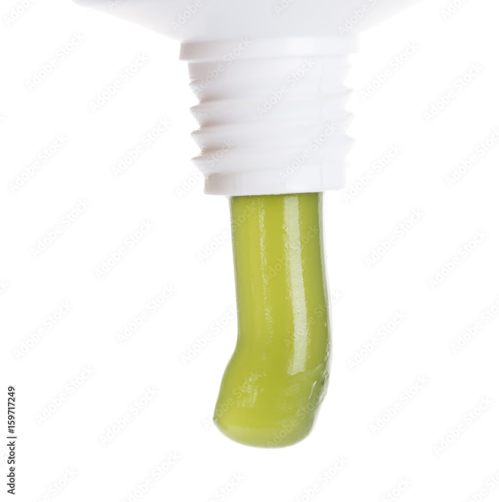Fresh green gel toothpaste oozing out of tube. Closeup. Stock Photo ...