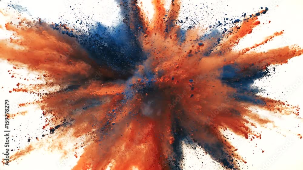 Colorful powder/particles fly after being exploded against white ...