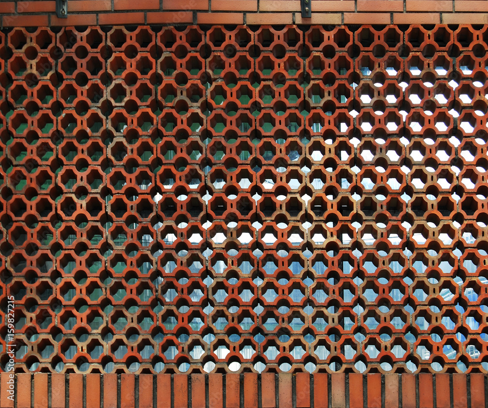 Red hollow brick wall. Stock Photo | Adobe Stock