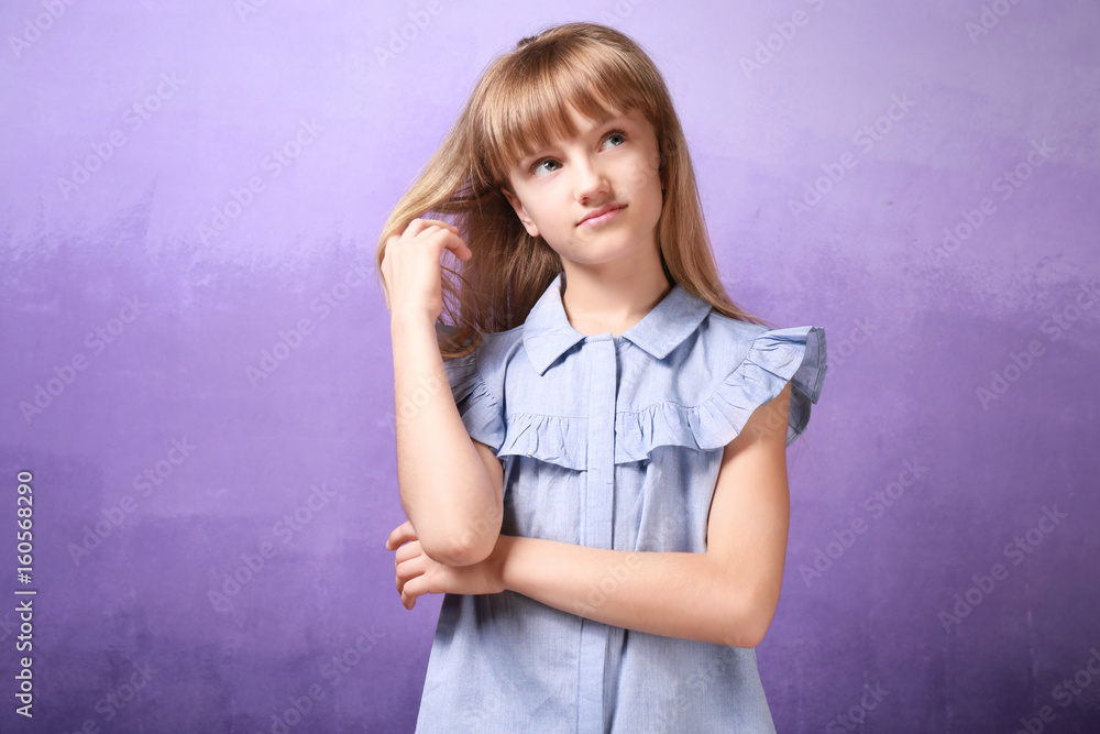 Pretty little girl on color background Stock Photo | Adobe Stock