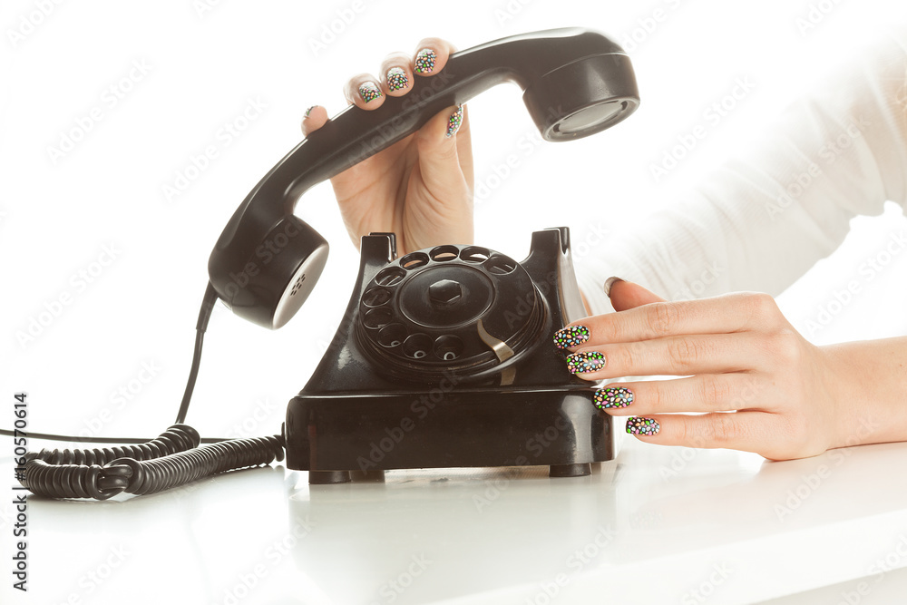 Woman's fingers dialing a vintage rotary dial telephone Stock Photo ...