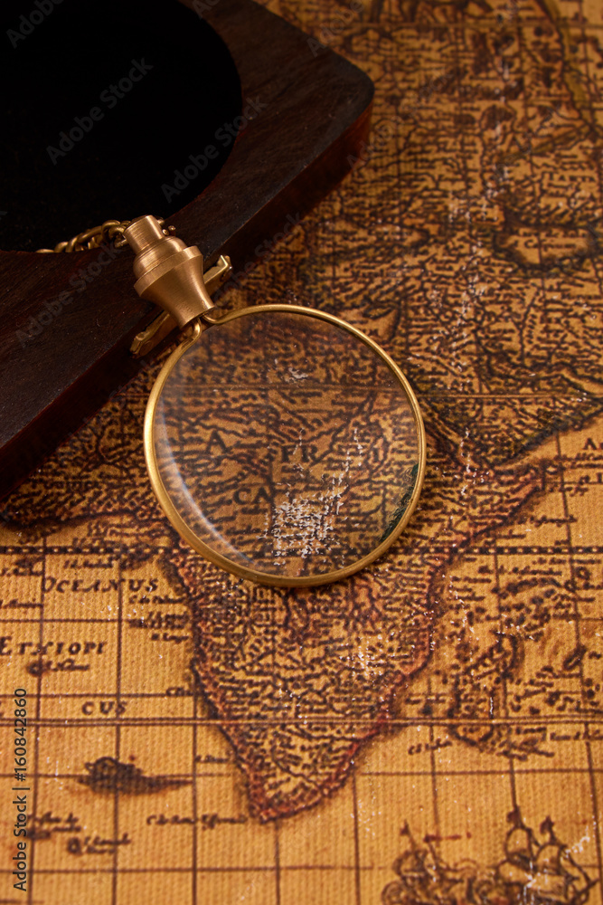 Old vintage retro compass on ancient world map. Vintage still life ...