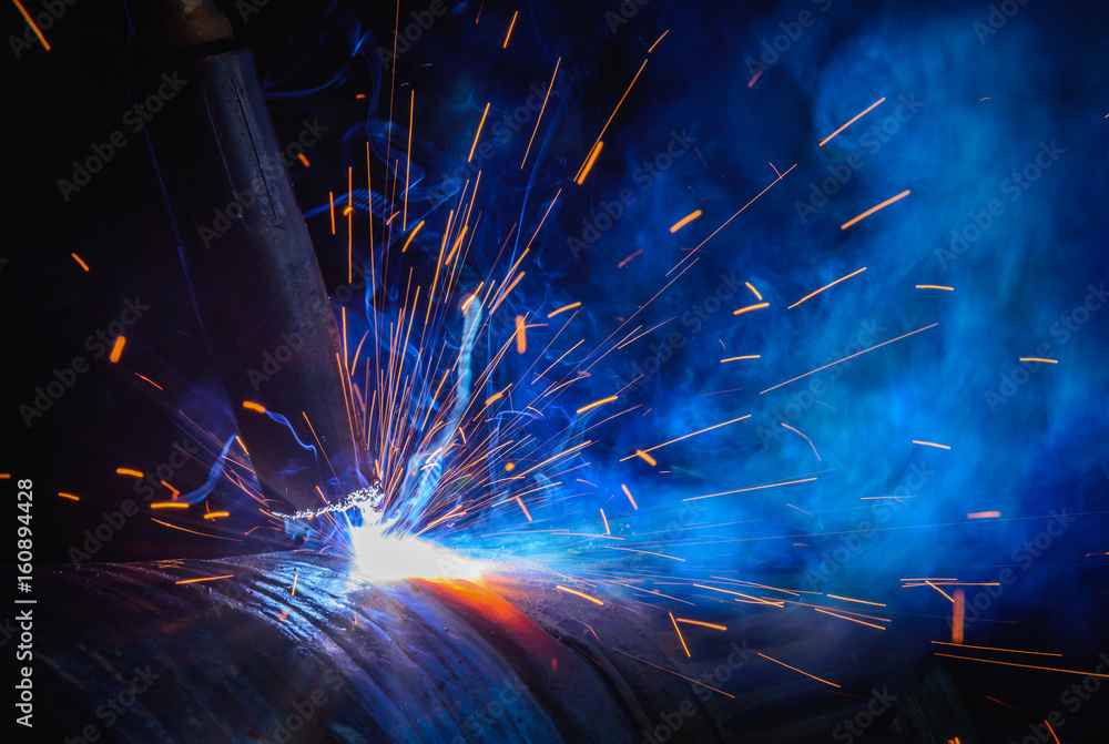 Welding steel structures and bright sparks in steel construction ...